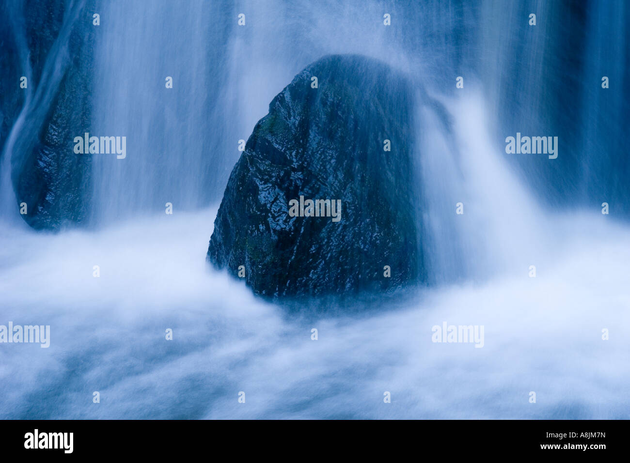 Water falling on the rock Stock Photo - Alamy