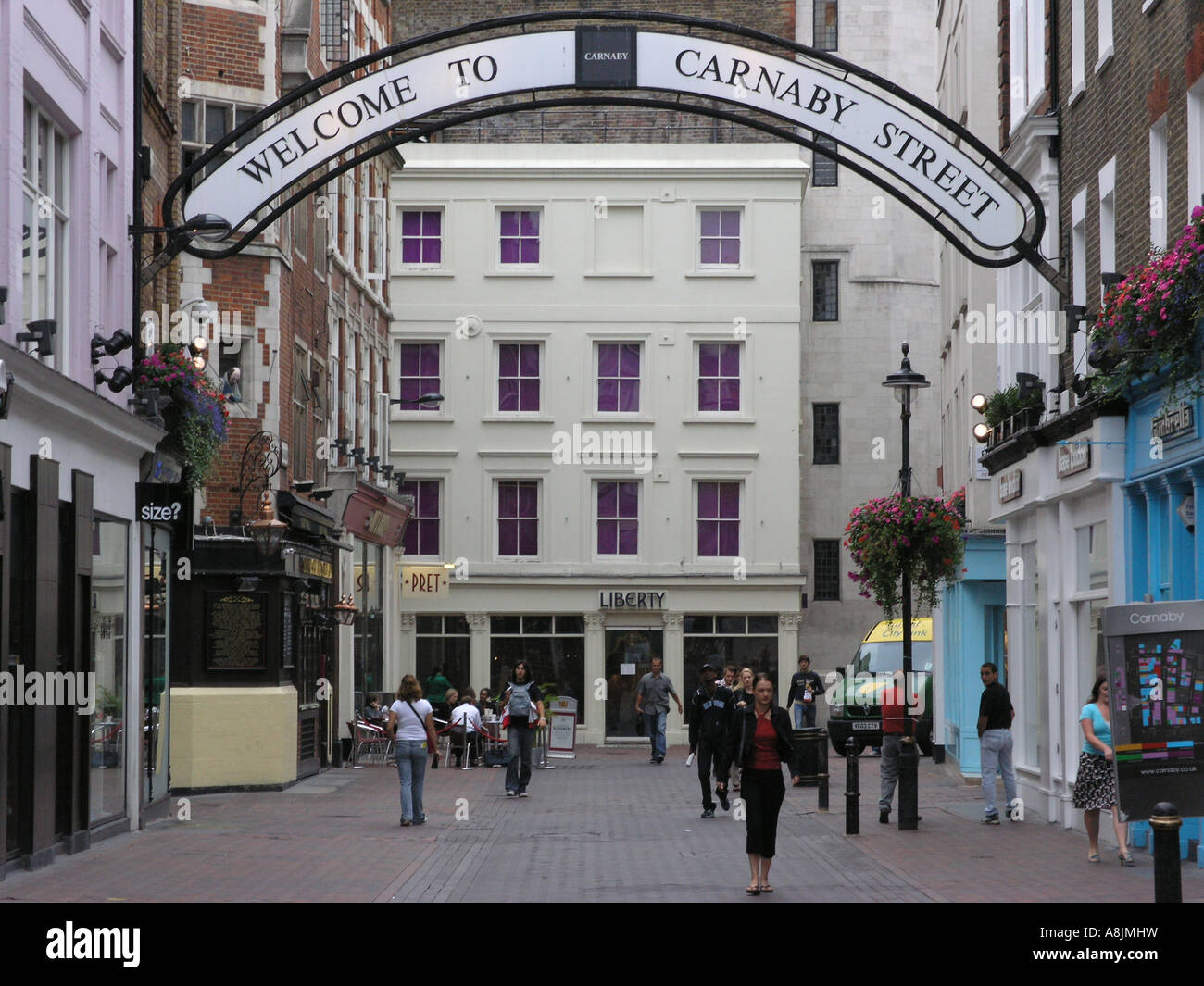 welcome to carnaby street swinging 60's london sign over street england ...