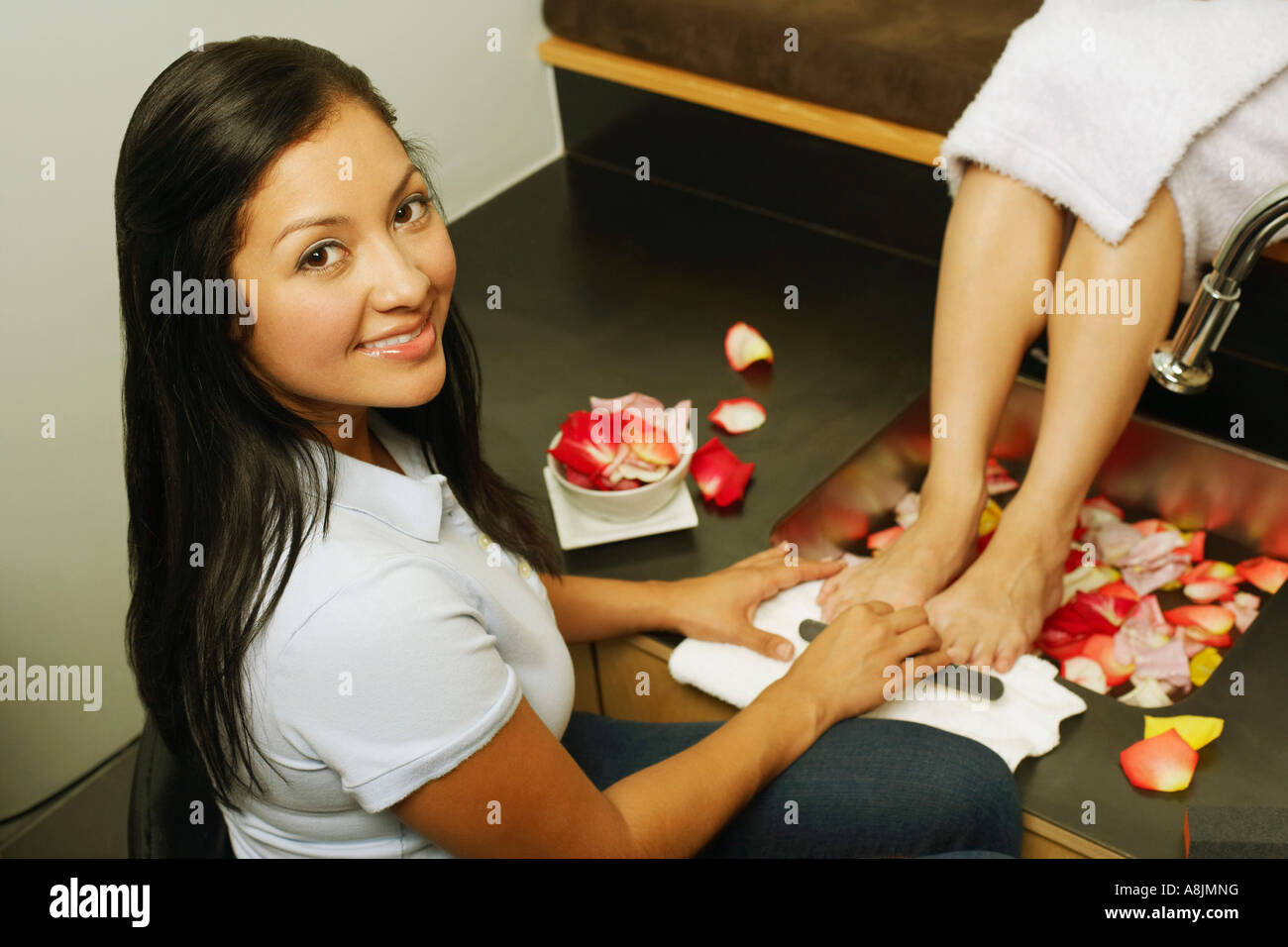 Low section view of a woman getting a pedicure Stock Photo - Alamy