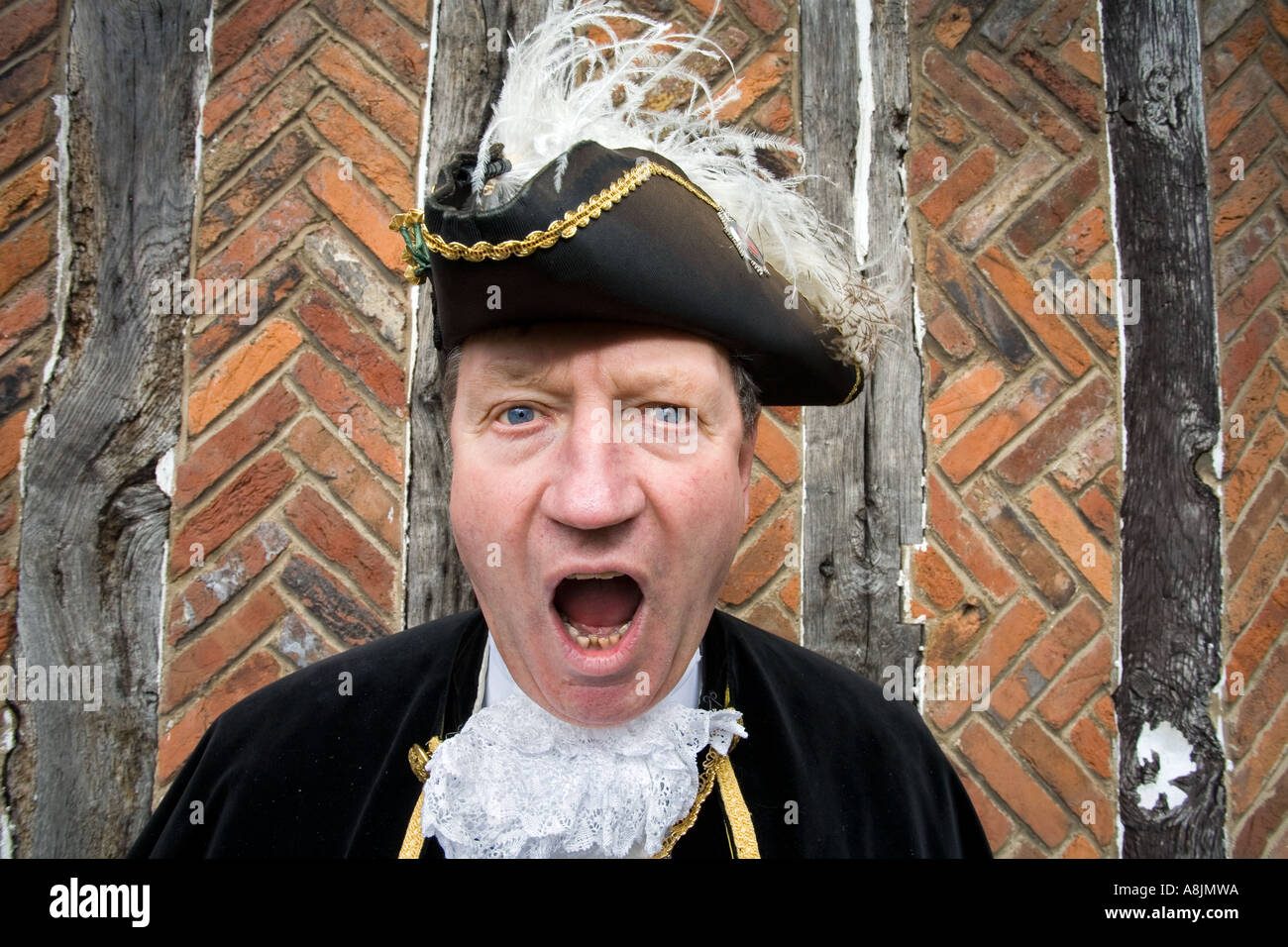 Colchester Town Crier Robert Needham in action shouting Stock Photo - Alamy