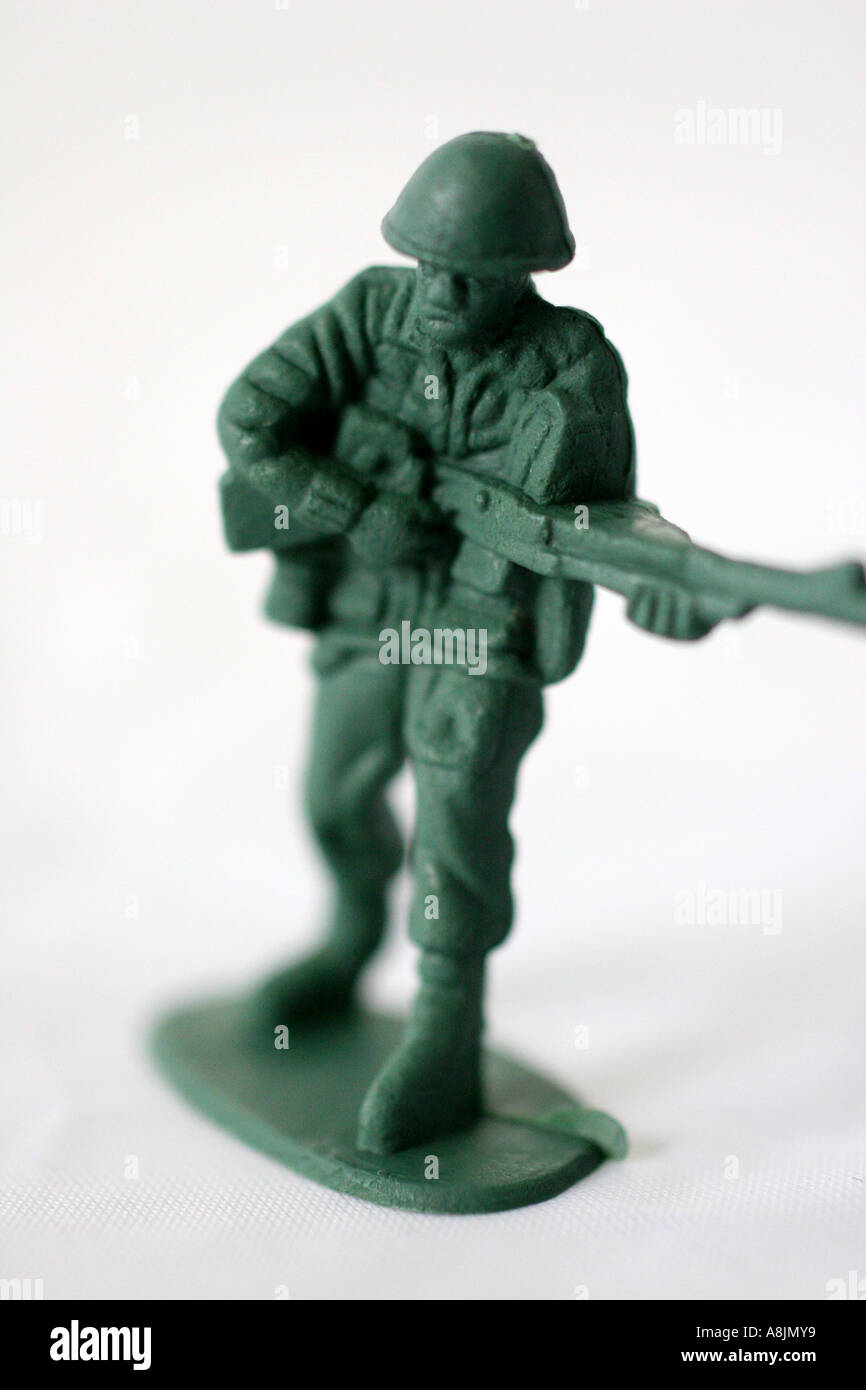 Toy plastic soldier holding rifle Stock Photo - Alamy
