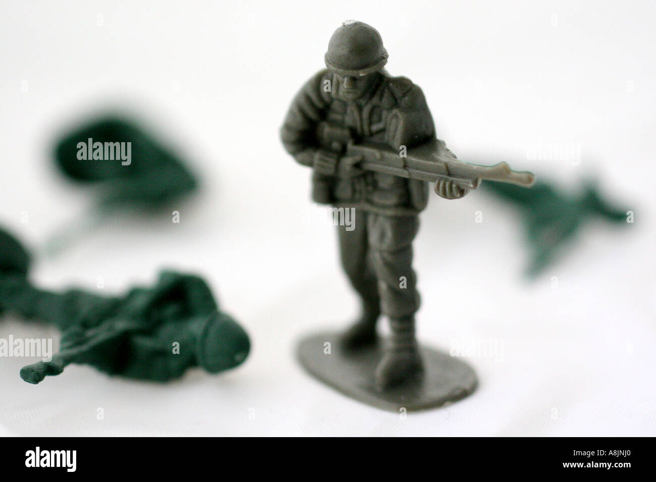 toy soldiers with some fallen over Stock Photo - Alamy