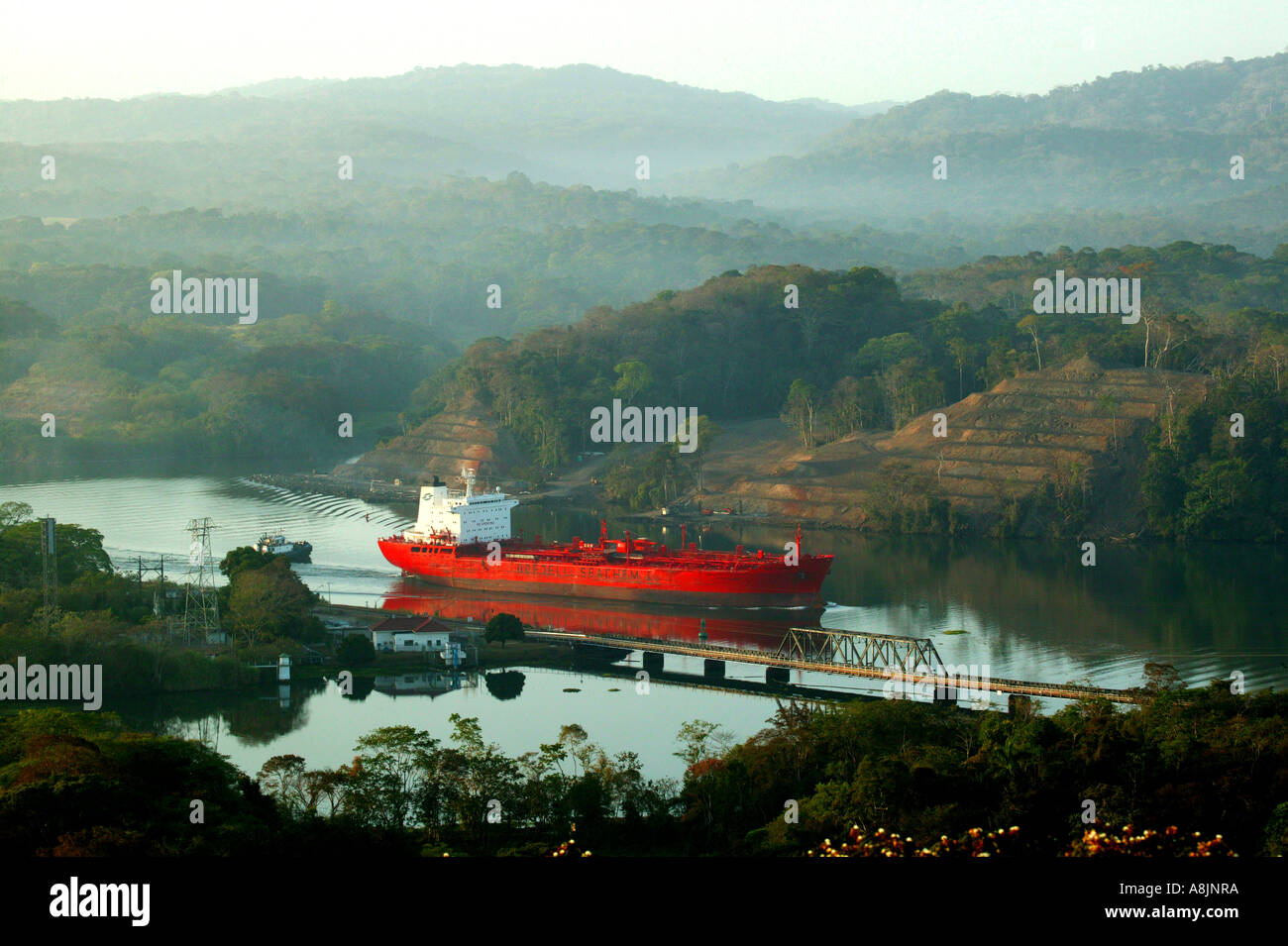 Panama landscape with red vessel from Odfjell Seachem sailing through ...