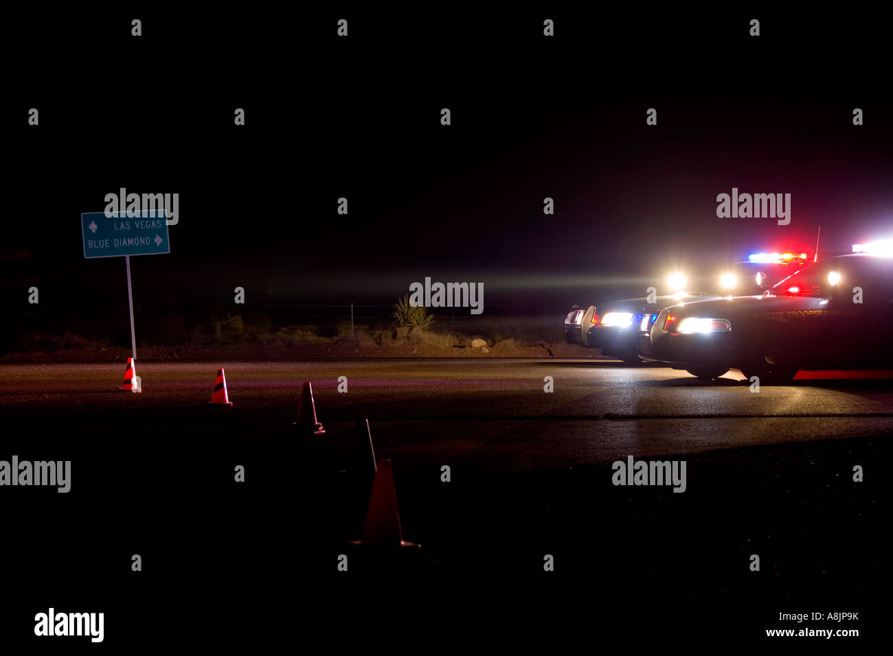 Police night road block hi-res stock photography and images - Alamy