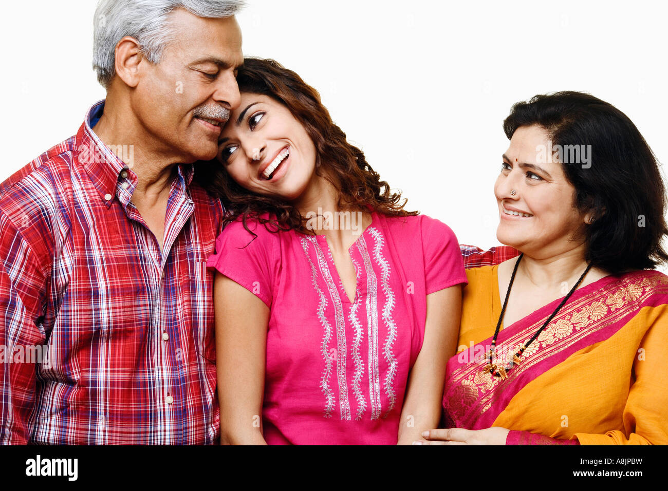 Close-up of a young woman and her parents smiling Stock Photo - Alamy