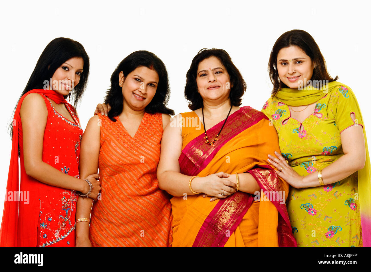 Portrait of four women smiling together Stock Photo - Alamy Portrait of four women smiling together Stock Photo - Alamy