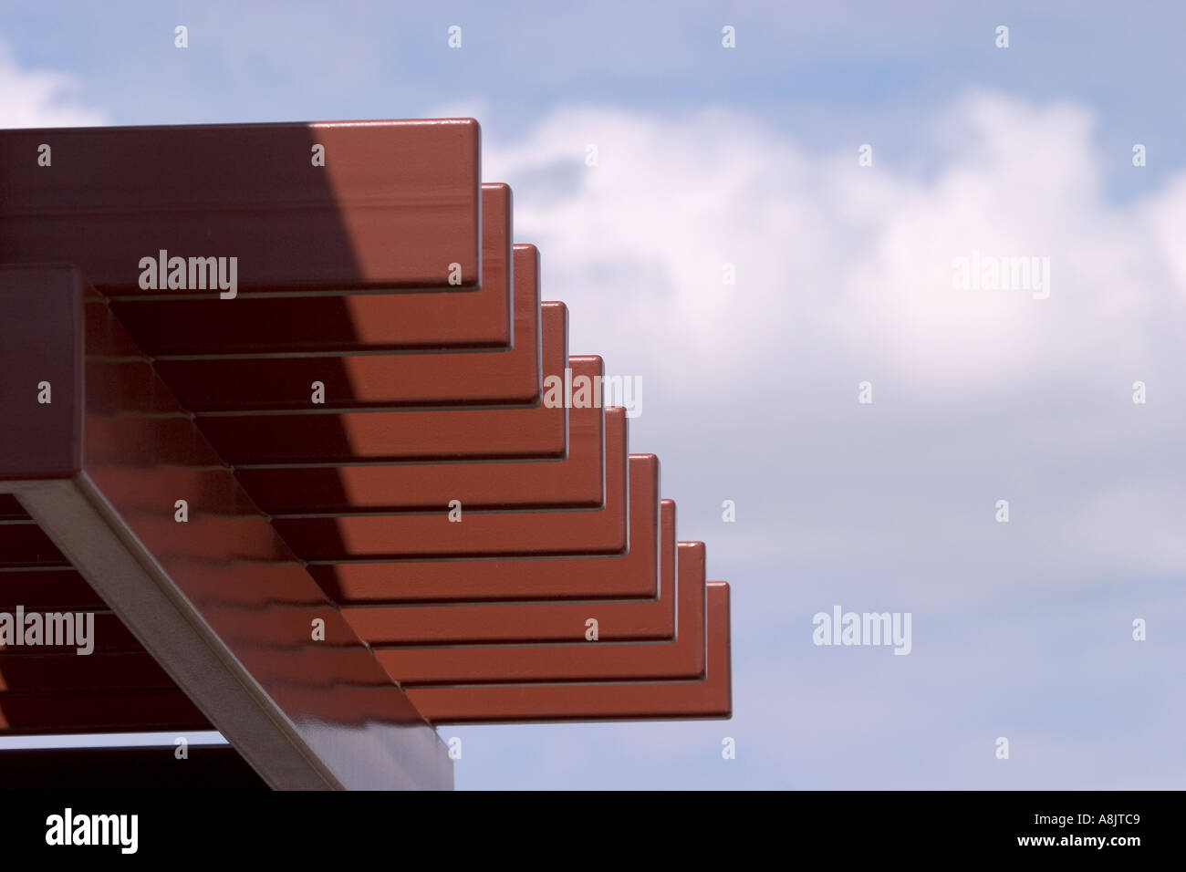 Red metal trellis on an office building Stock Photo - Alamy