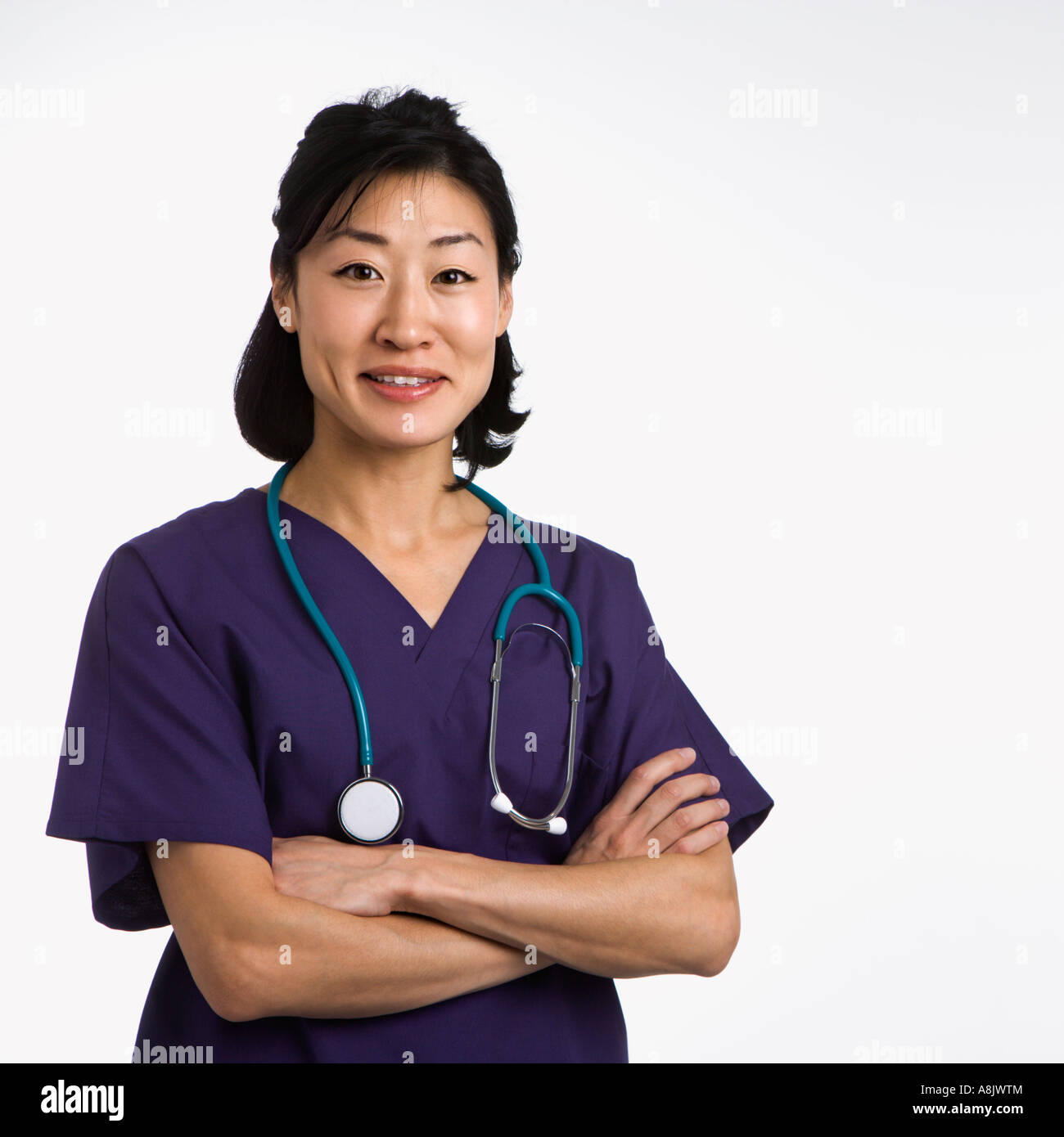 Asian woman doctor half length portrait against white background Stock ...