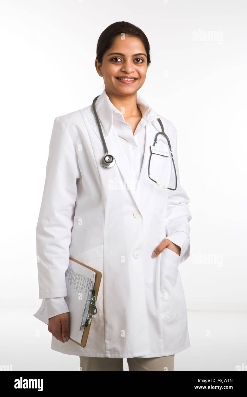 Indian woman doctor portrait standing against white background Stock ...