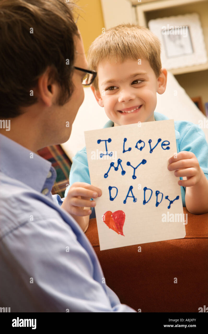 Boy giving card to dad hi-res stock photography and images - Alamy