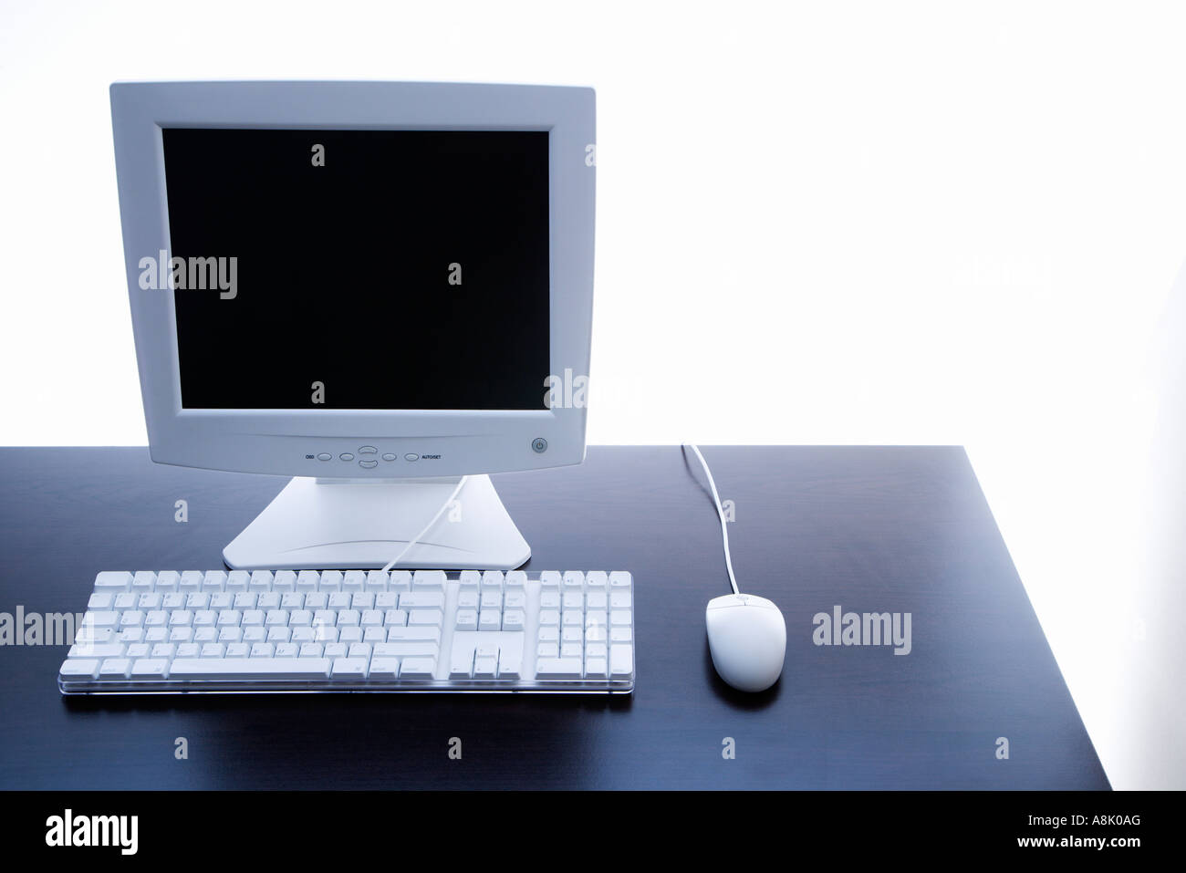 Still life of computer monitor keyboard and mouse Stock Photo - Alamy