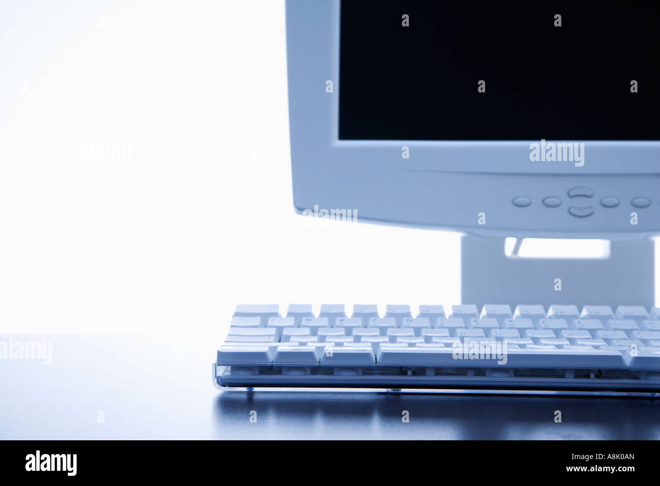 Still life of computer monitor and keyboard Stock Photo - Alamy