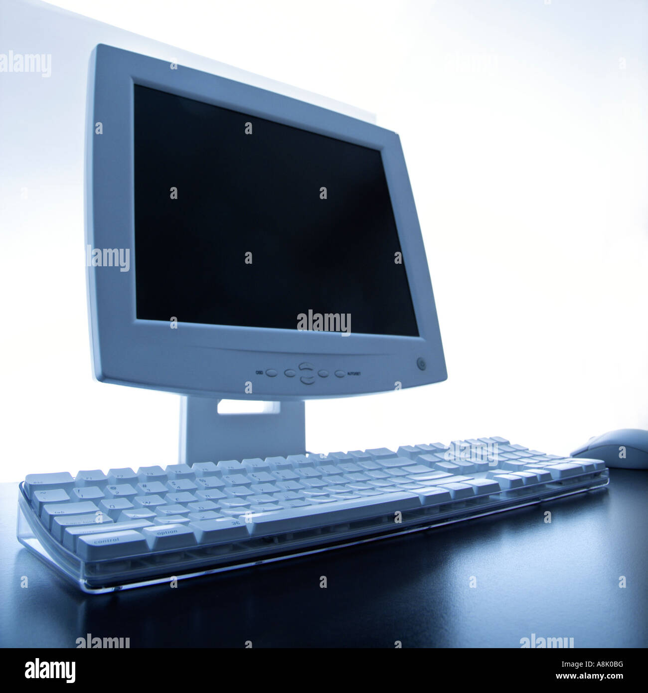 Still life of computer monitor keyboard and mouse Stock Photo - Alamy