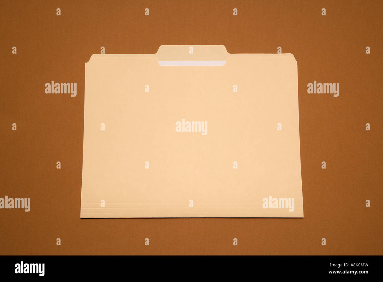 Blank folder on brown blackground Stock Photo - Alamy