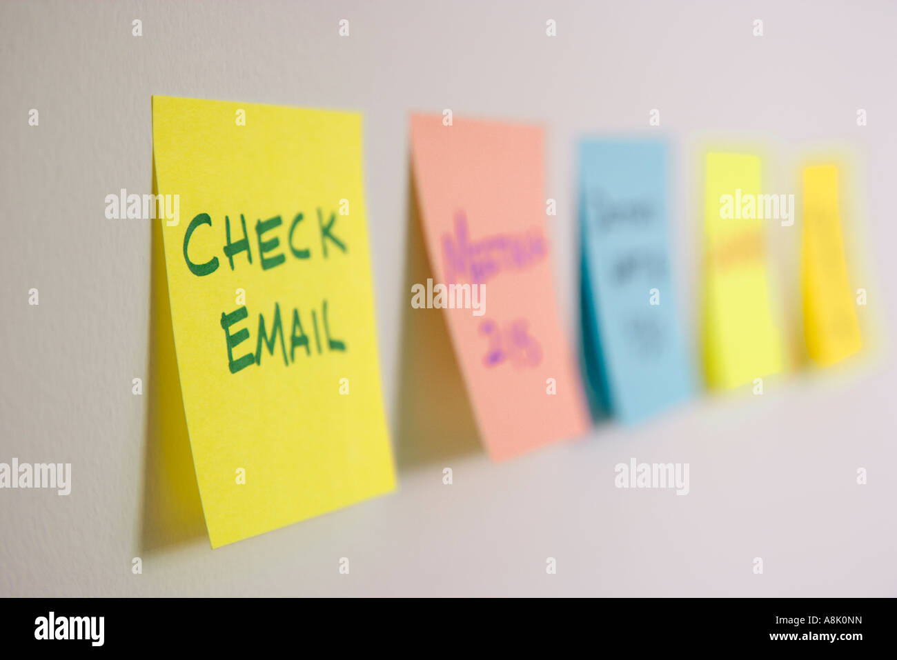 Sticky notes of to do list on wall Stock Photo - Alamy
