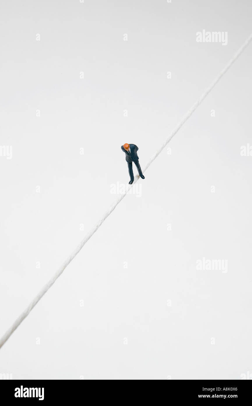 Walking a tightrope hi-res stock photography and images - Alamy