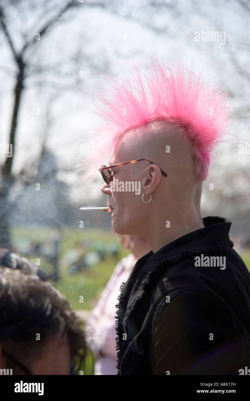 Punk with Pink Hair Smoking a Cigarette UK London Stock Photo - Alamy