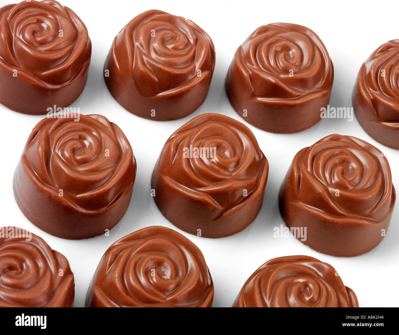 CHOCOLATE FLOWERS ON WHITE Stock Photo - Alamy