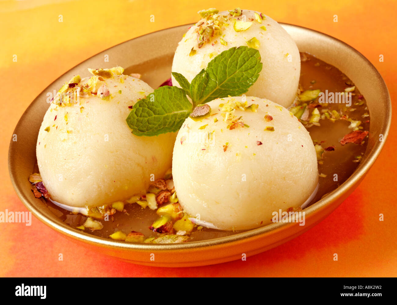 Indian rasgulla dessert hi-res stock photography and images - Alamy
