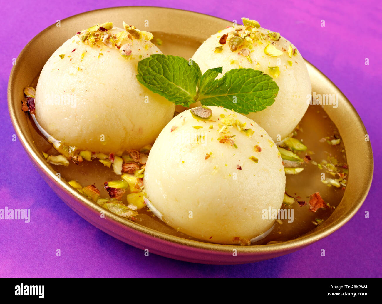 Indian rasgulla dessert hi-res stock photography and images - Alamy