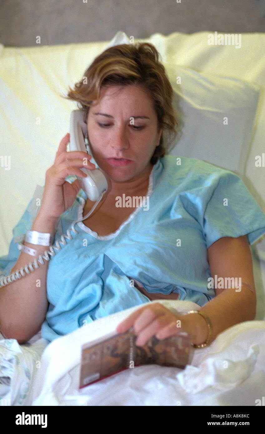 Mom age 32 discussing delivery of new baby on phone. Fairview Southdale ...