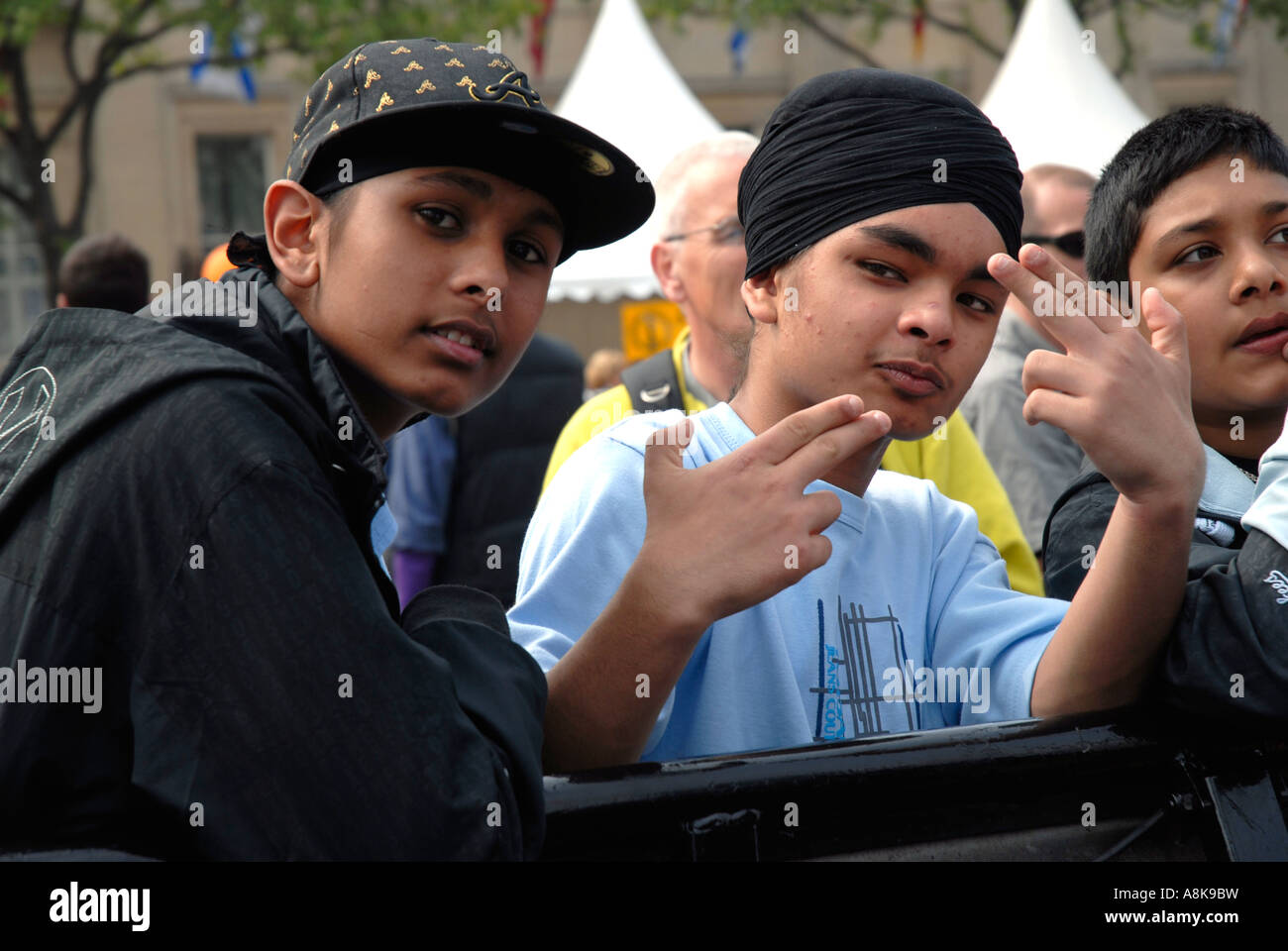 Two sikh boys one dressed traditional one western Celebration of Hindu ...