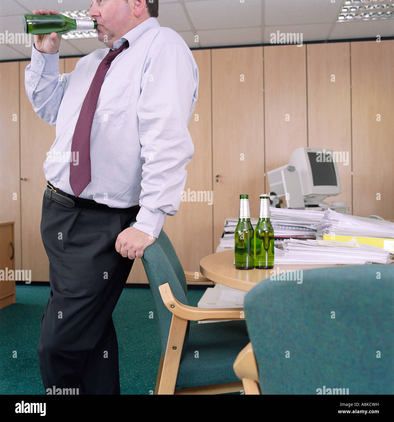 Drunk man leaning on table hi-res stock photography and images - Alamy