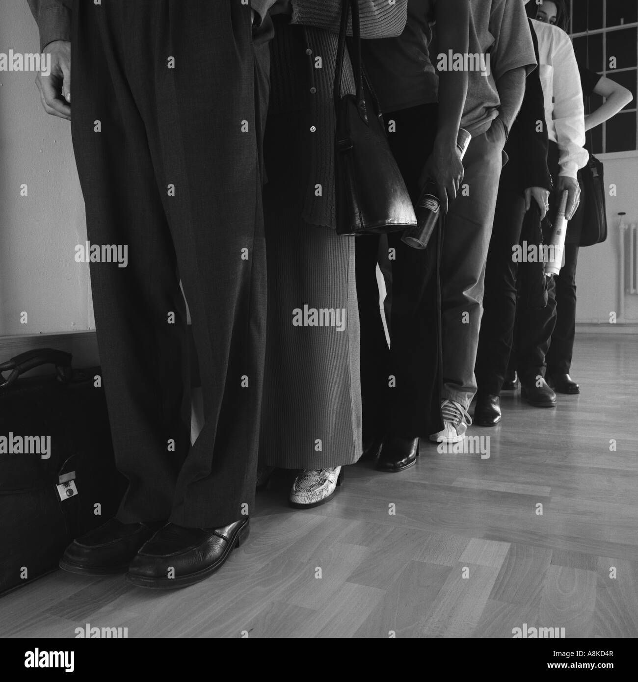 People standing in a queue Stock Photo - Alamy People standing in a queue Stock Photo - Alamy