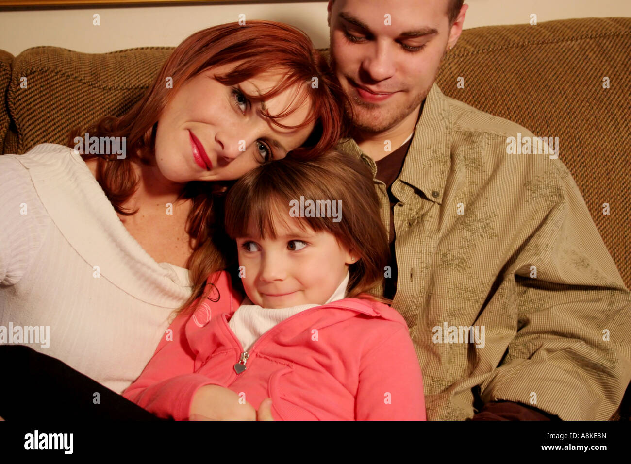 Family together at home Stock Photo - Alamy