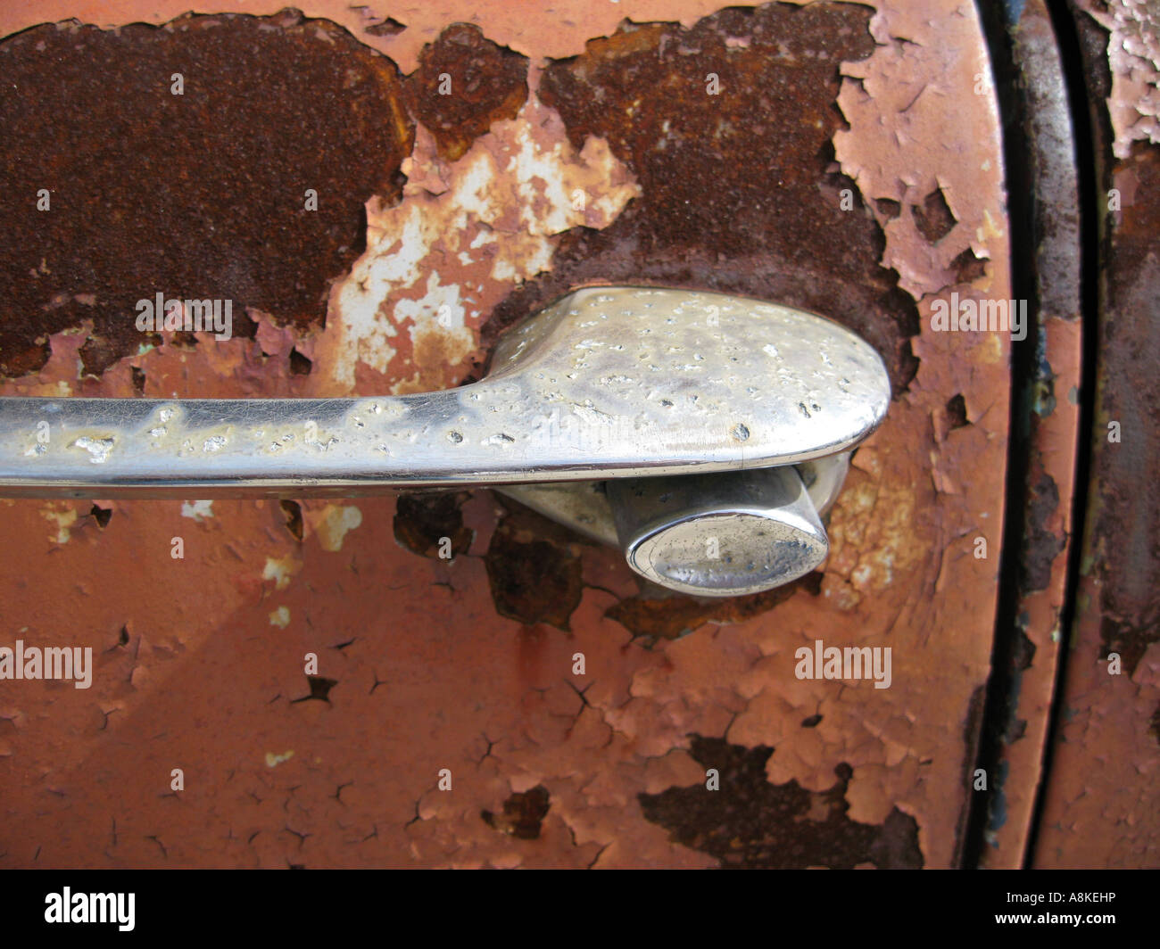 Old rusty car door handle Stock Photo - Alamy