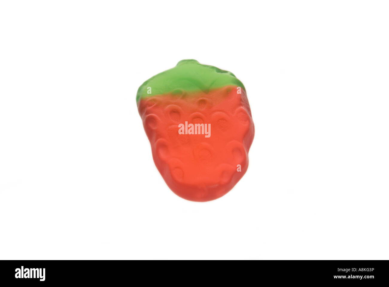 Horizontal close up of one single strawberry shaped jelly sweet on a ...