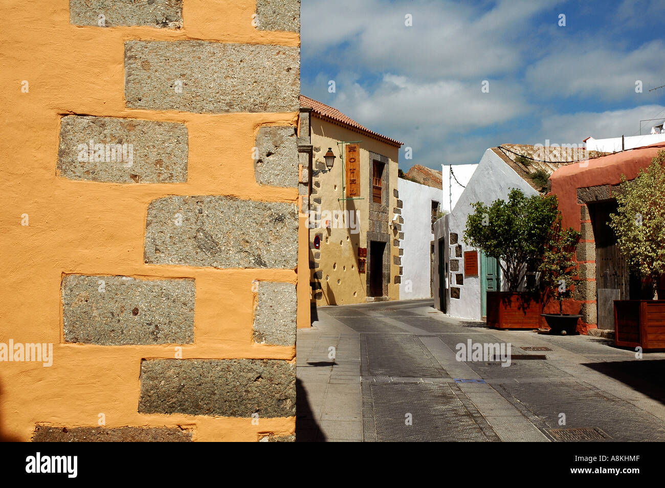 Painted basalt stone houses in typical style in Aguimes town in Gran ...