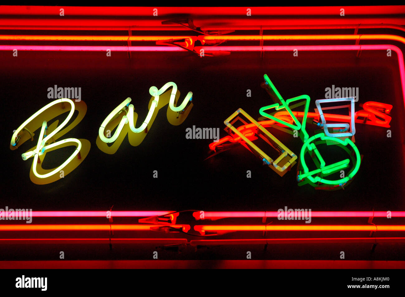 Bar neon light sign lit up at night Stock Photo - Alamy