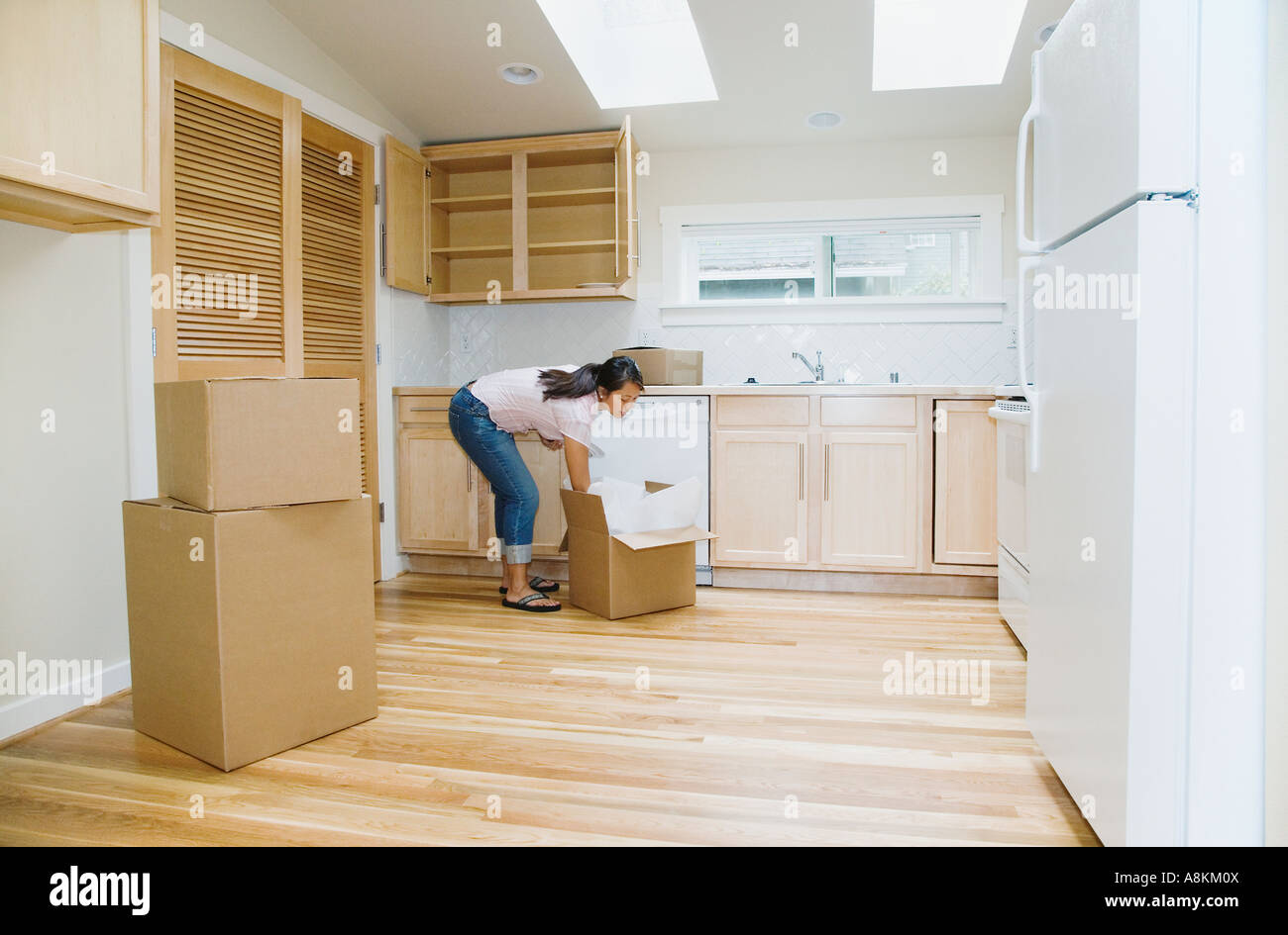 Woman exiting house hi-res stock photography and images - Alamy