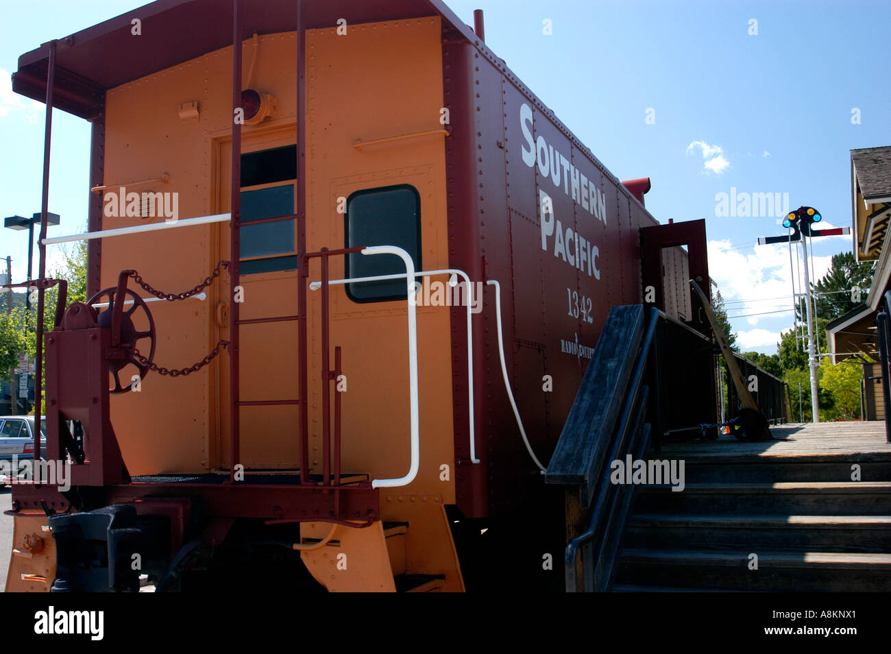 A bright red historic train railcar caboose of Southern Pacific ...