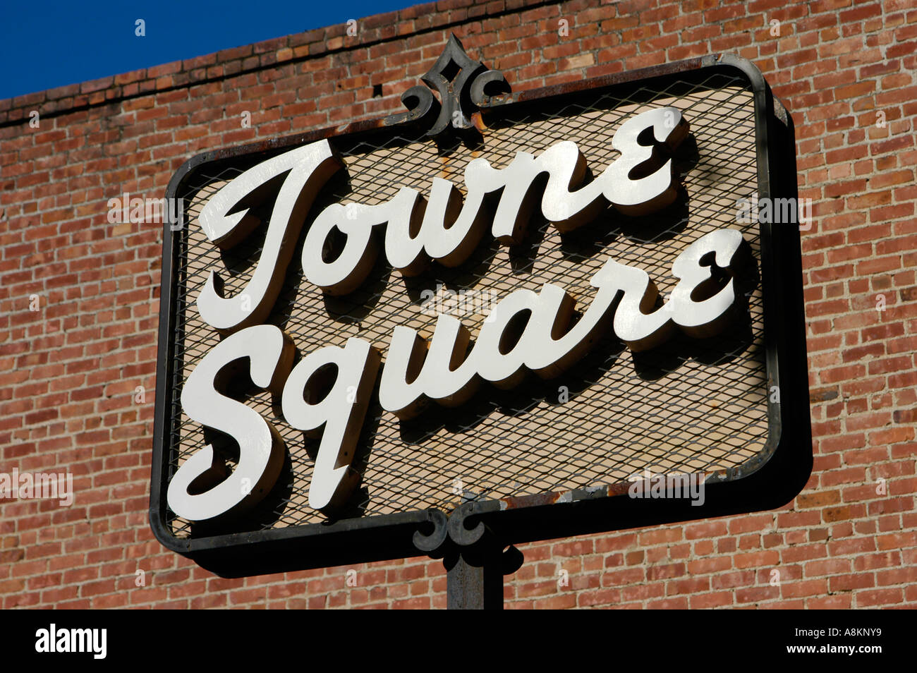 Antique decorative iron sign with the words Towne Square in script ...