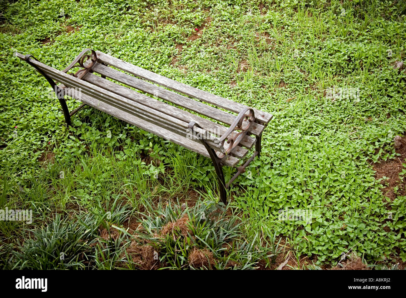 Quiet bench seat in yard Stock Photo - Alamy