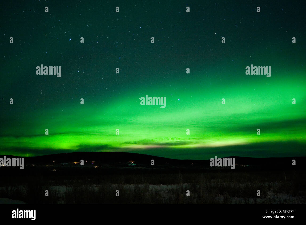 Aurora borealis over the horizon. This is a type of aurora that makes ...