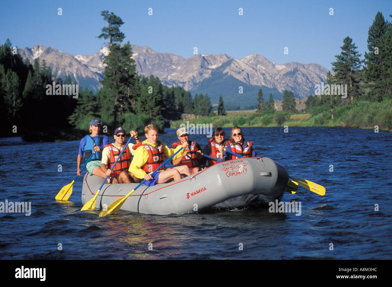 USA IDAHO Happy rafters paddling on the Upper Salmon River with ...