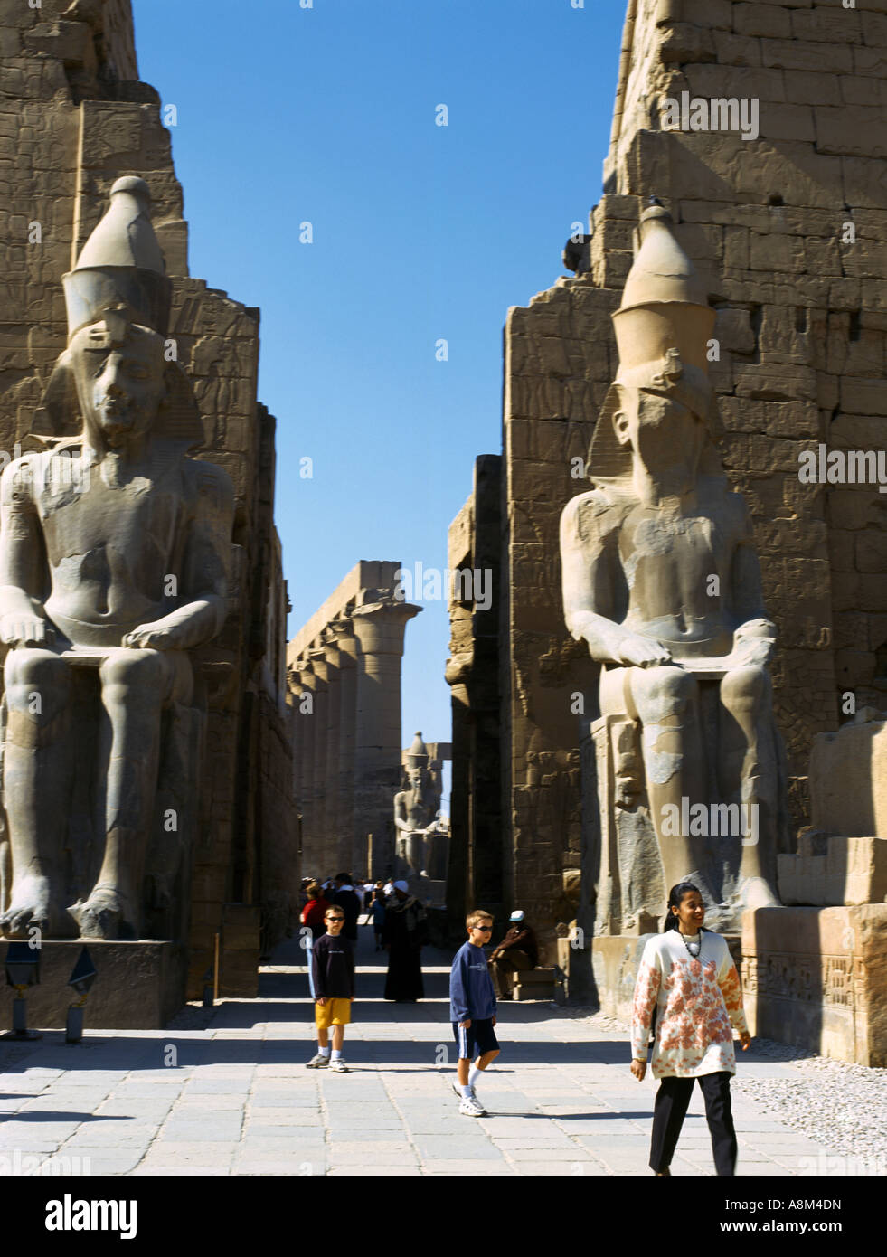 Luxor Egypt Luxor Temple First Pylon Statues Of Ramses & Children Stock ...