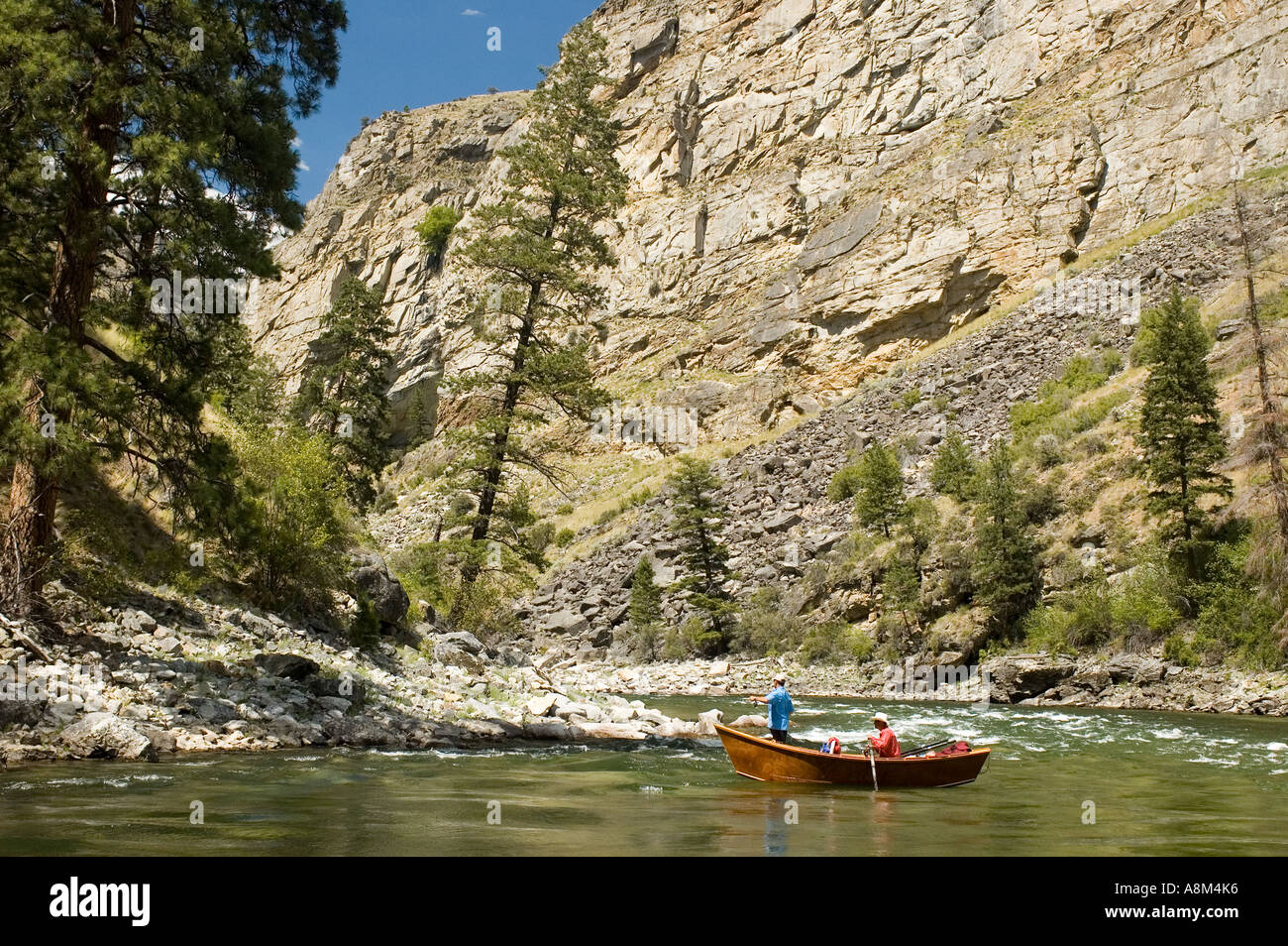 IDAHO MIDDLE FORK OF THE SALMON RIVER Fly Fishing from a wooden drift ...