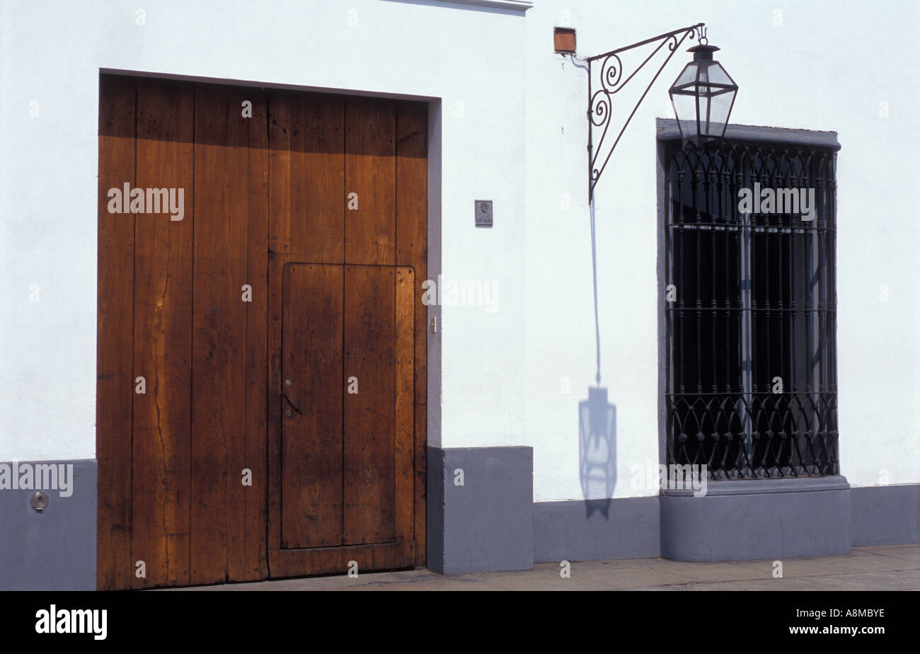 Street lamp and its shadow on a building in Trujillo Stock Photo - Alamy