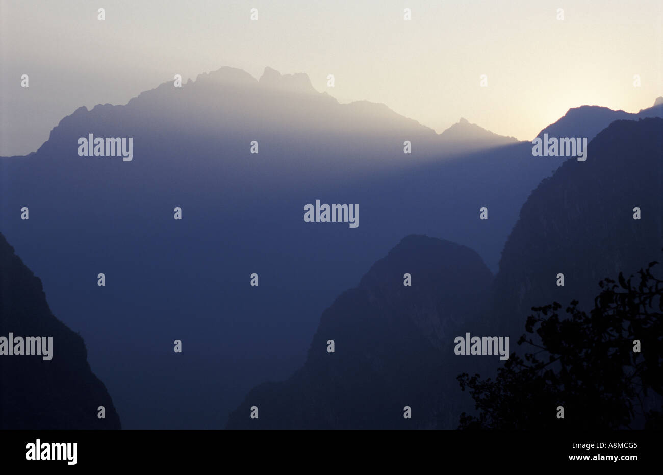 Sunrise on the mountains around Machu Picchu in Peru Stock Photo - Alamy