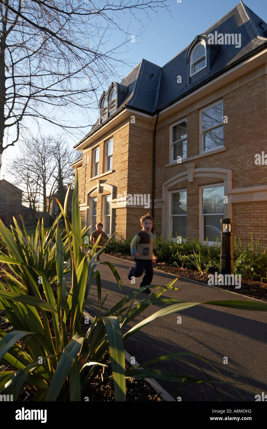 Two young boys children brothers running Stock Photo - Alamy