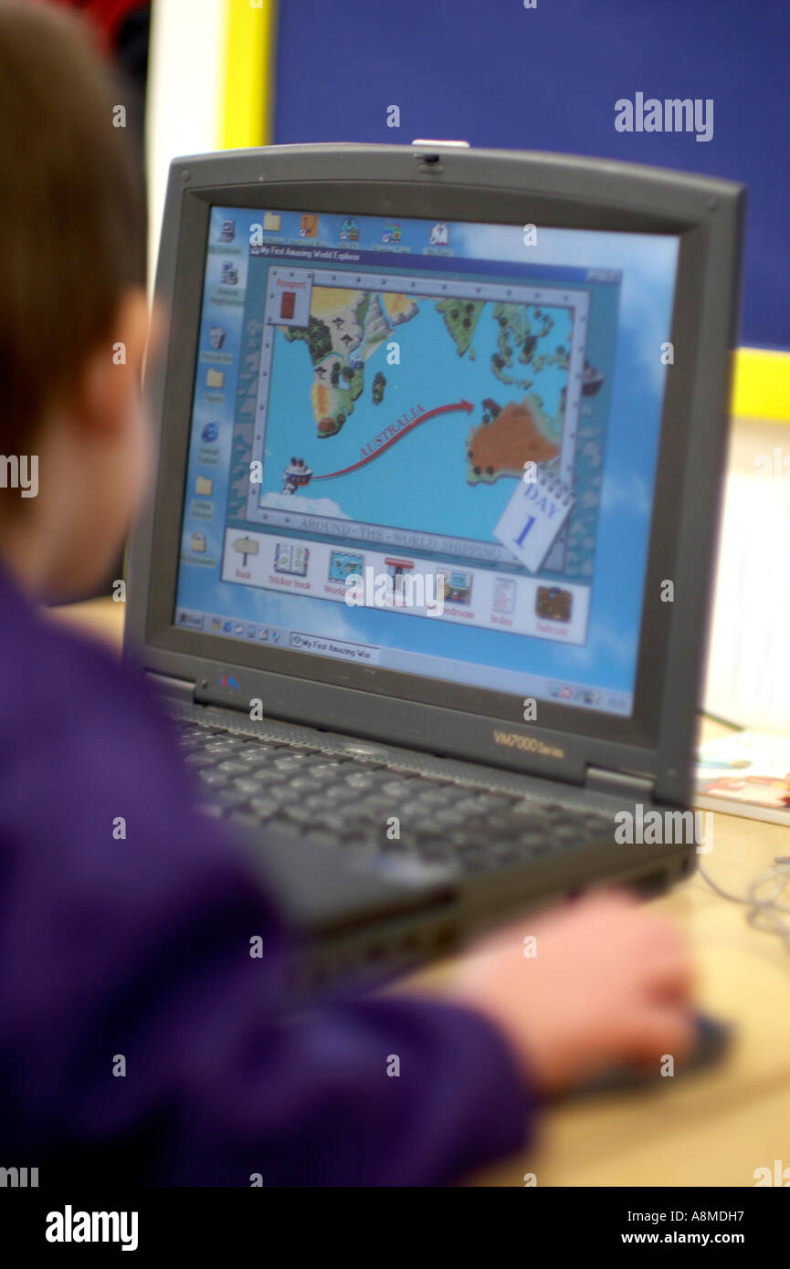 Young boy child playing on educational computer in nursery school Stock ...