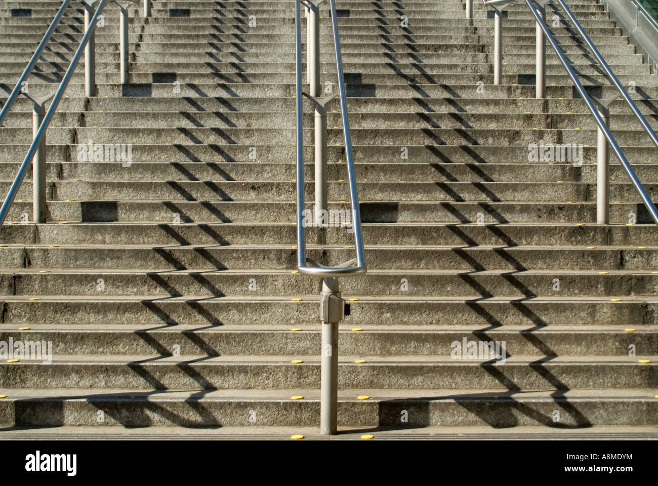 Horizontal close up of a symmetrical flight of concrete steps in the ...