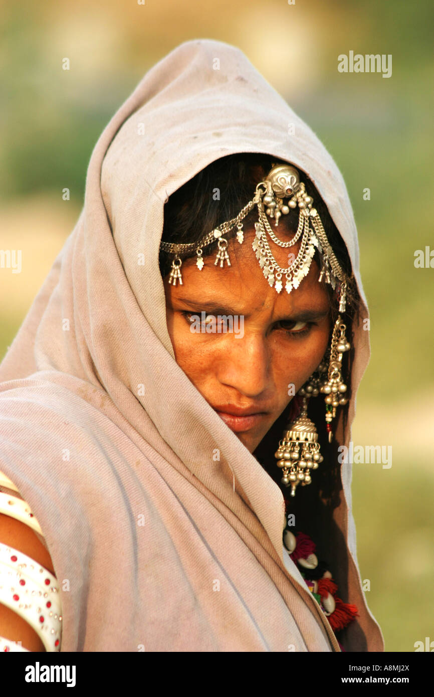 A Mir tribal woman wearing tradional jewellery ,Gujarat India Stock ...