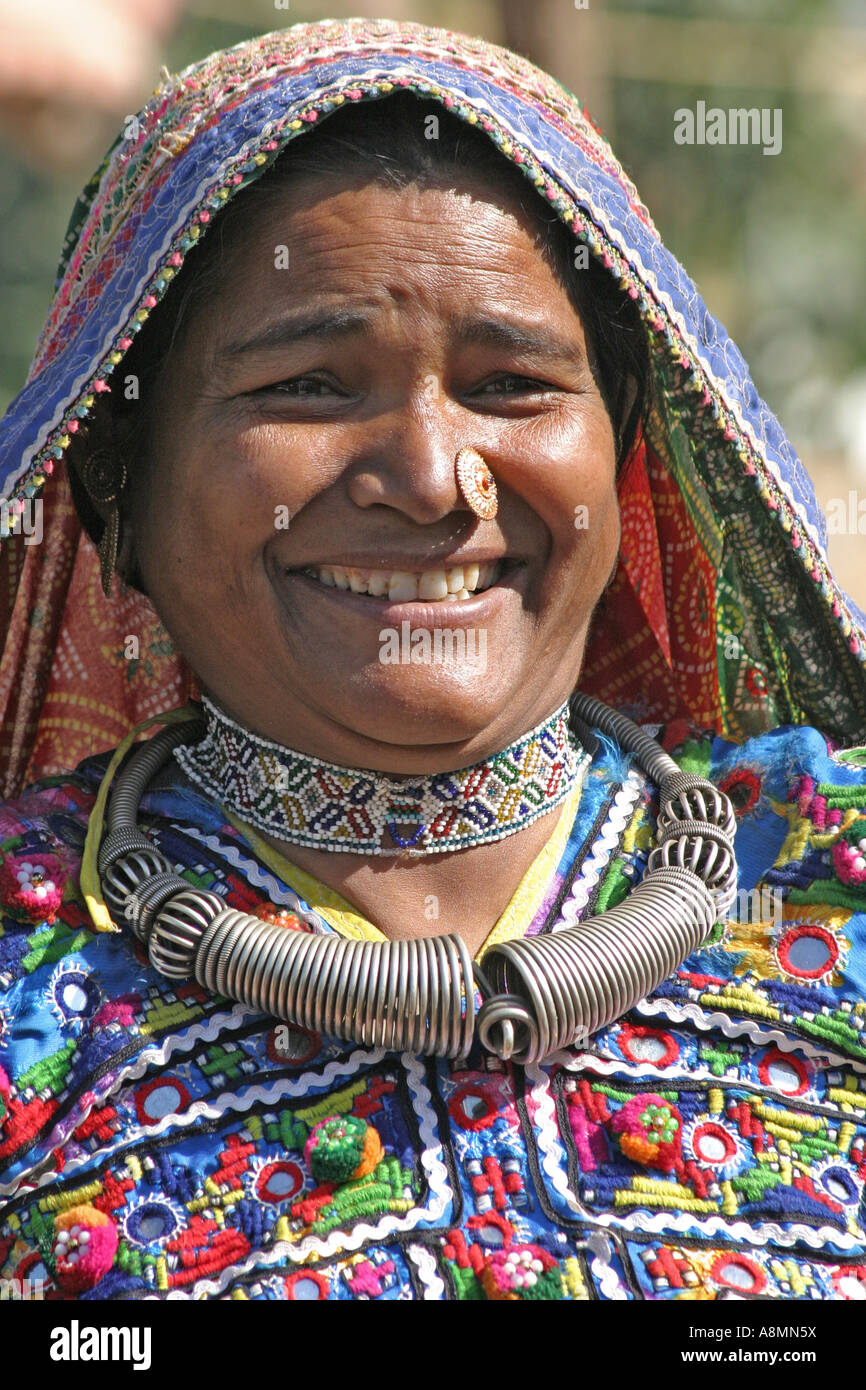 Vividly colorful traditional dress of a Tribal woman in a Banni Village ...