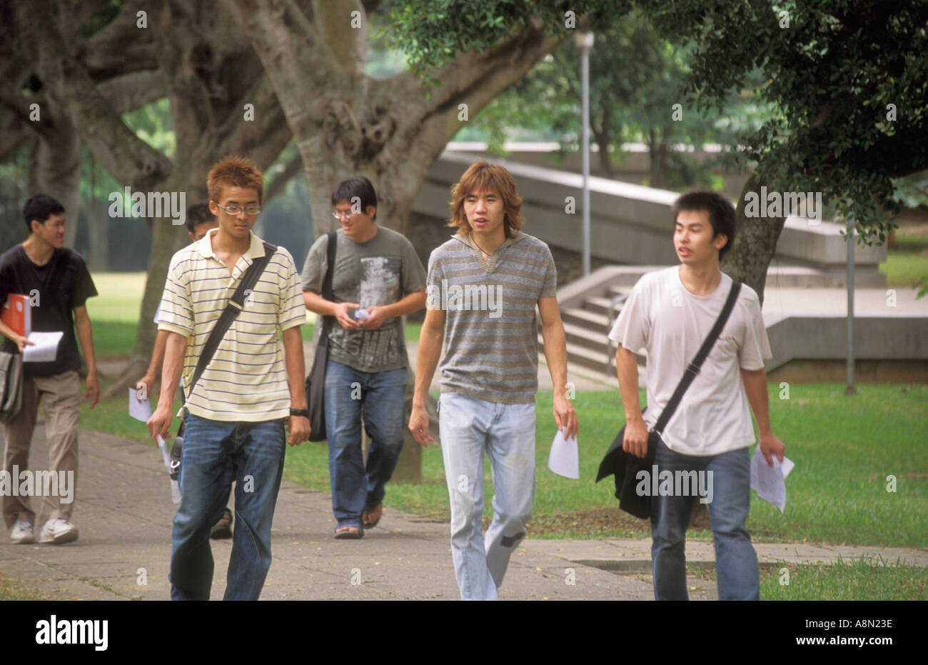 Chinese Asian university students walking on college campus Taiwan ...