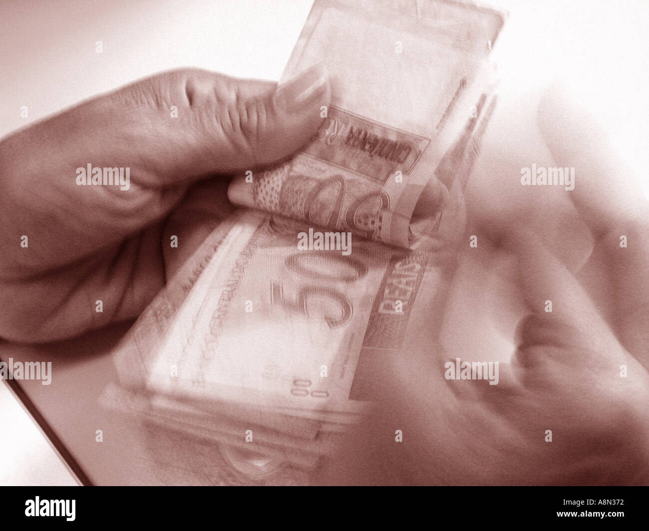 Detail of hands counting money Stock Photo - Alamy